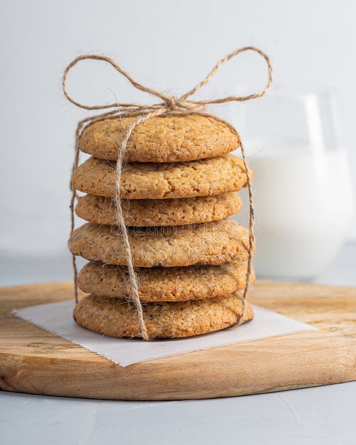 Plain cookies with milk stock photo. Image of board - 274272228