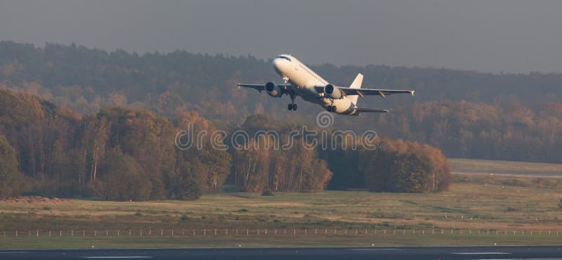 An Airplane Starting at an Airport at Night Stock Photo - Image of ...
