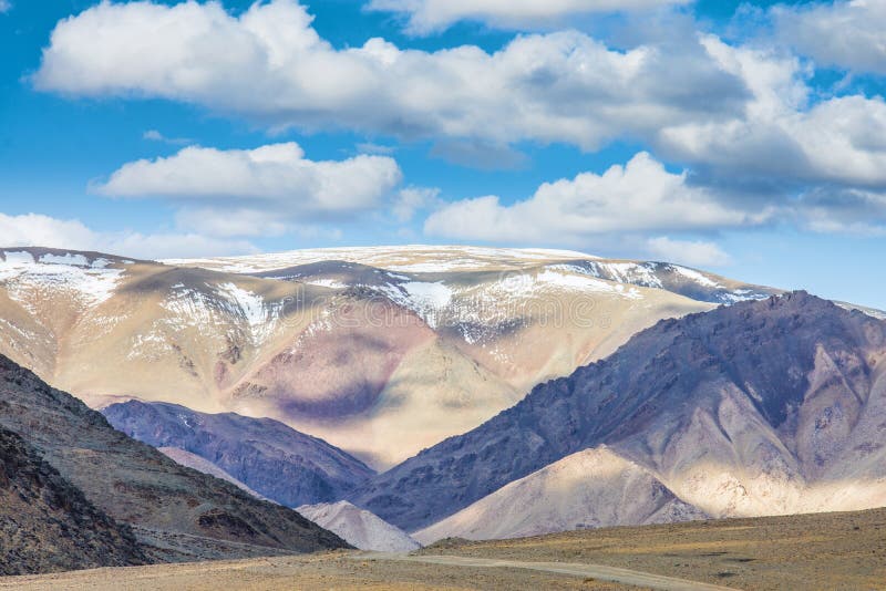 Plain at root of mountains stock photo. Image of formation - 100903534