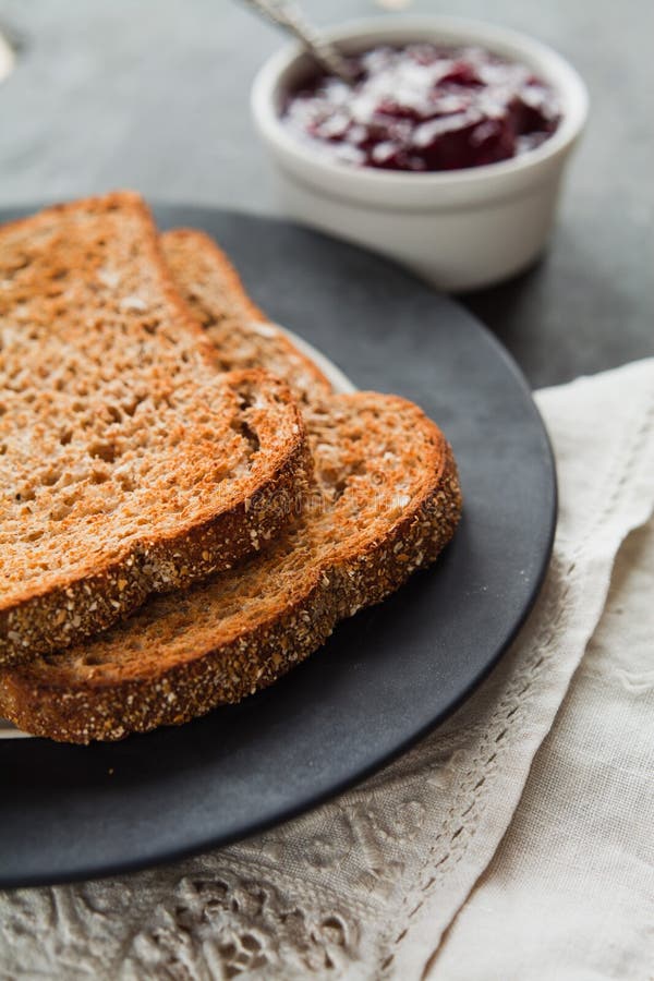 Plain Toast on a Plate with Knife Stock Image - Image of displayed ...
