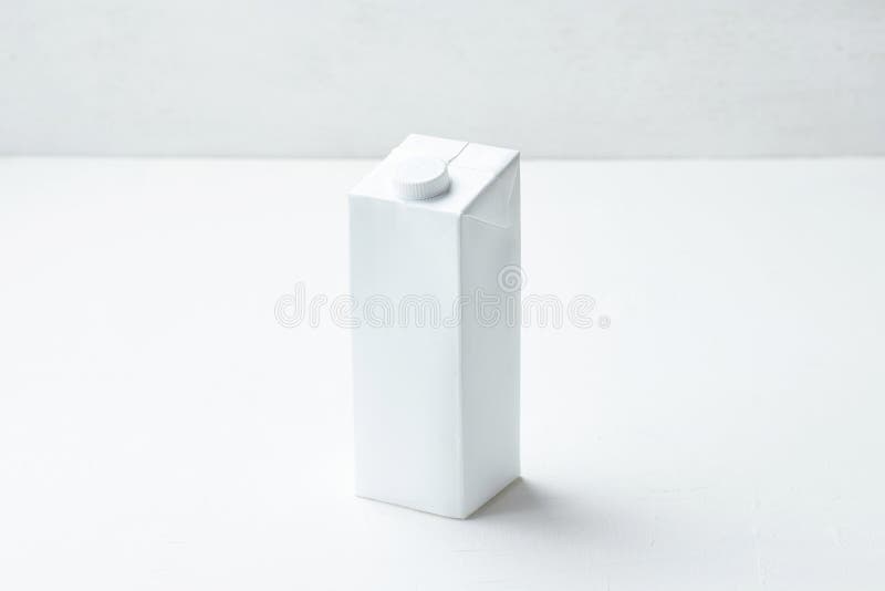 Plain White Carton Milk Box Standing Upright on a Simple White ...