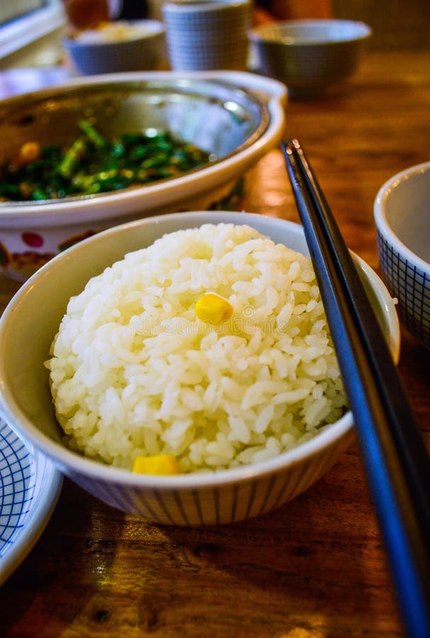 Plain White Rice in a Bowl with Chopsticks Placed Aside. Stock Image ...