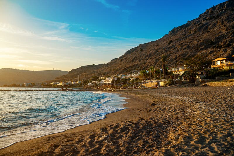 Plakia Beach with houses stock photo. Image of water - 315313012