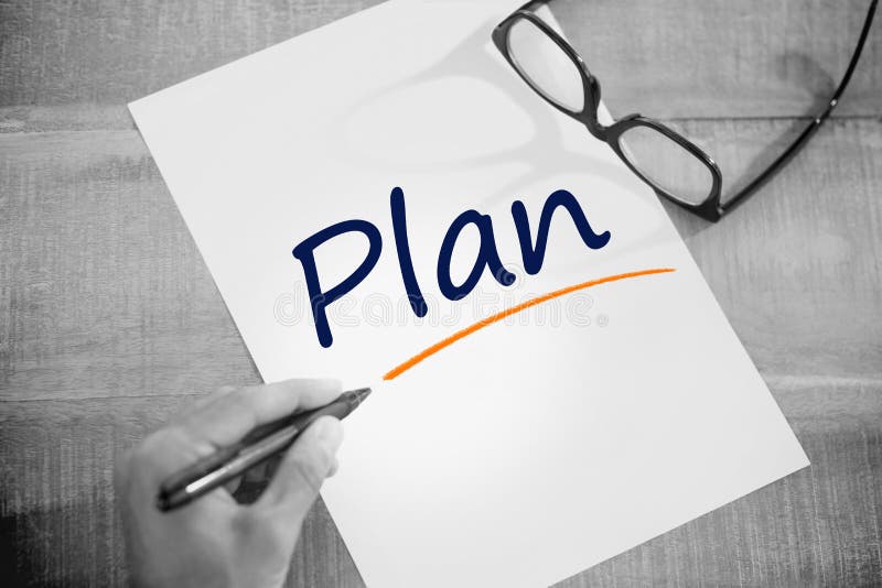 Plan Against Left Hand Writing on White Page on Working Desk Stock ...