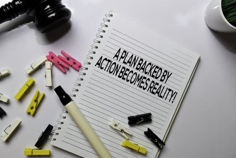 A Plan Backed by Action Becomes Reality! Text on a Book at Office Desk ...