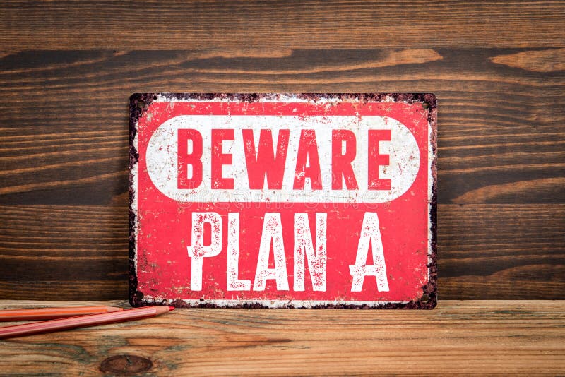 Plan a. Beware Sign with Text on a Wooden Texture Office Table Stock ...