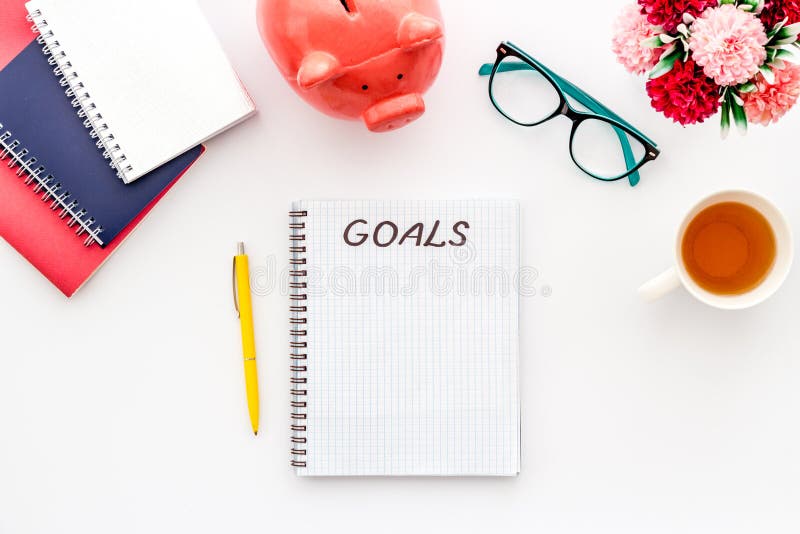 Plan Concept. Goals Text in Blank Notebook on White Office Desk Top ...