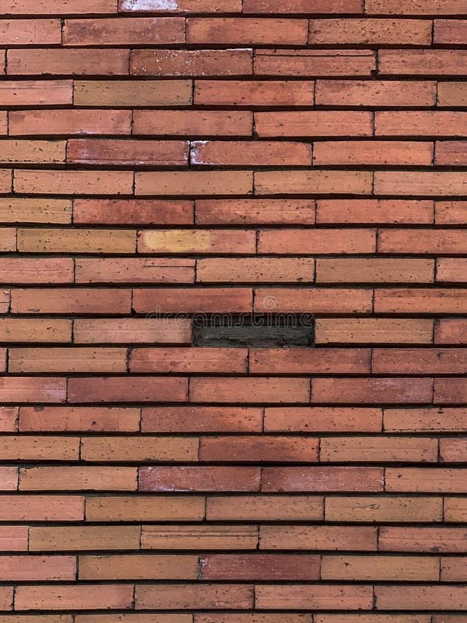 Plan Vertical D'un Mur De Brique Avec Une Brique Manquante Photo stock ...