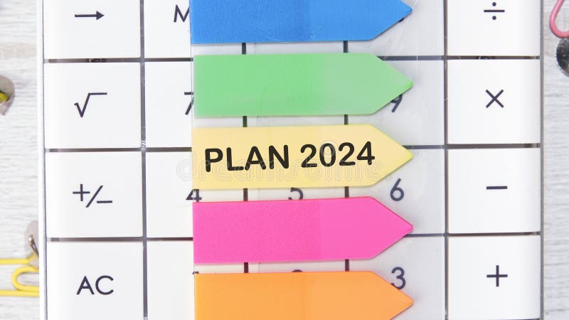 PLAN 2024 Written on the Sticker in the Shape of an Arrow on the ...