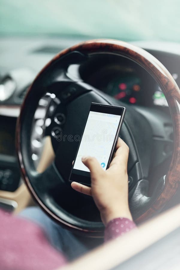 Plan Your Route in Real Time with this App. Closeup Shot of a Driver ...