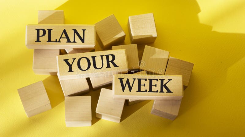Plan Your Week, Text is Written on Wooden Blocks and on Yellow ...