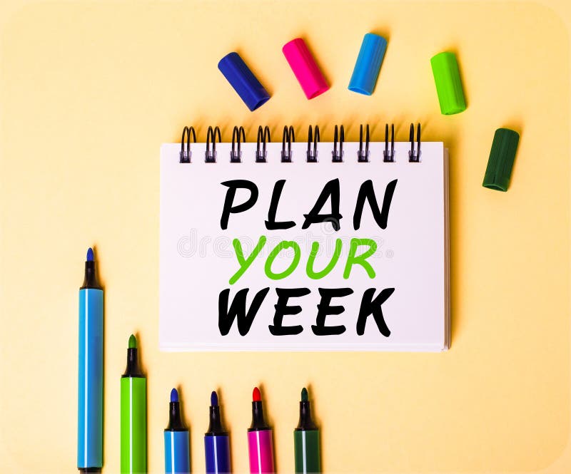 PLAN YOUR WEEK Written in a White Notebook on a Beige Background Near ...