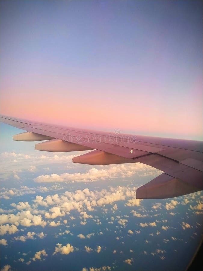 On the Plane, Above the Sky Stock Photo - Image of blue, orange: 201062422