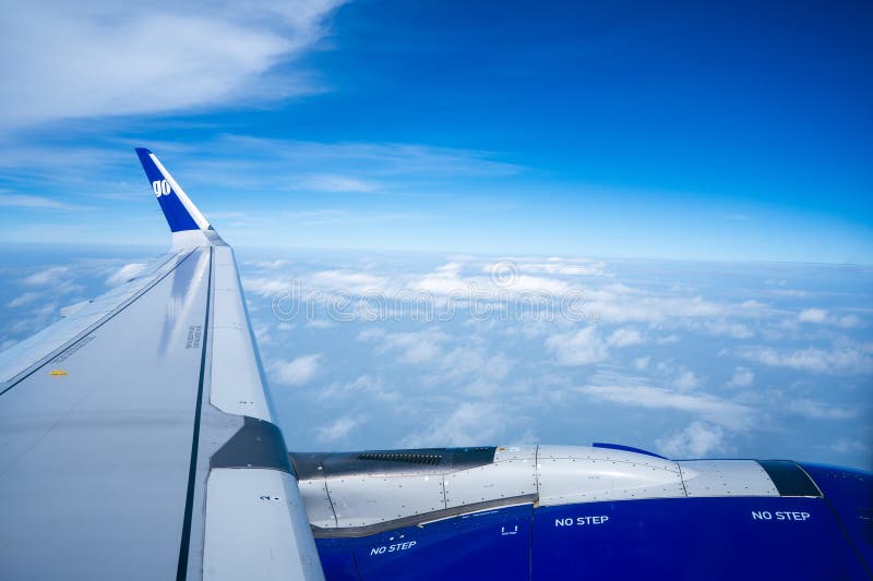 A Plane in the Air, Taken from Inside the Airplane. Cloud View from Plane Editorial Image ...