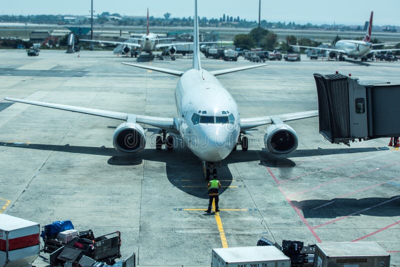 The Plane at the Airport on Loading Editorial Photography - Image of ...