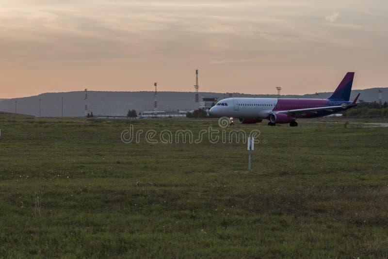 A Plane at the Airport Shot Close Stock Photo - Image of colors ...