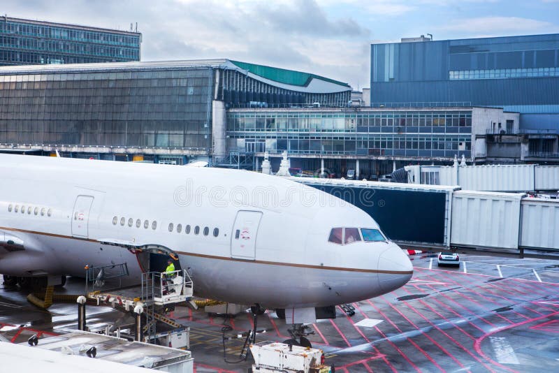 Plane at Airport Terminal stock photo. Image of boeing - 37913614
