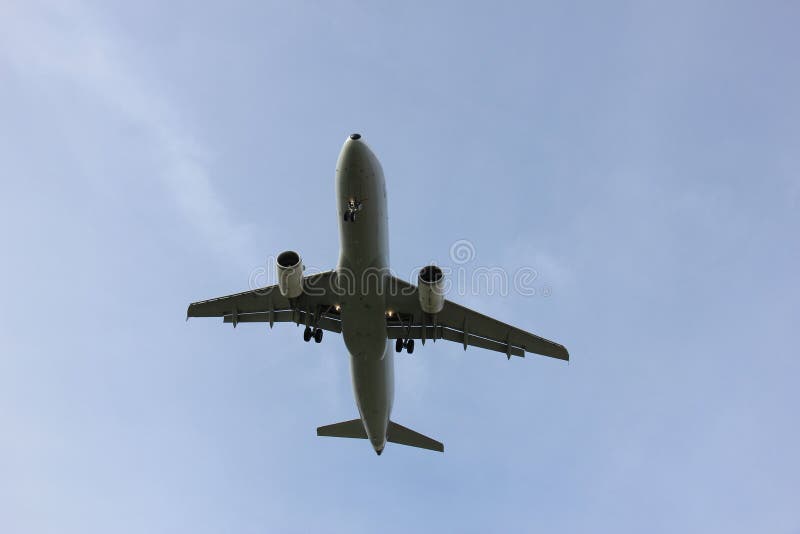 Plane approaching runway stock photo. Image of aviation - 69270760