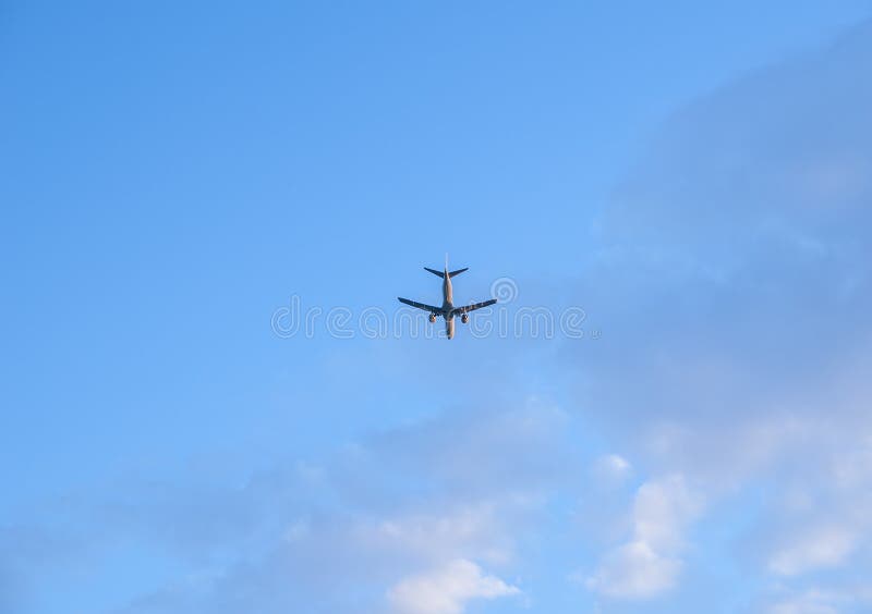 Plane in the blue sky stock photo. Image of blue, airplane - 149801750