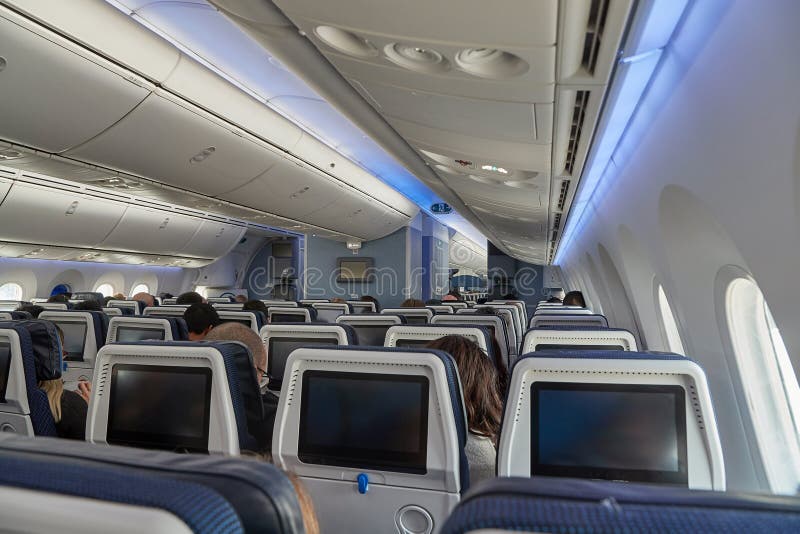 Plane cabin interior editorial photo. Image of full - 158083931