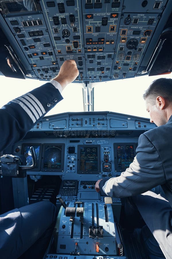 Aircraft Pilot Looking Back from His Seat in Cockpit Stock Photo ...