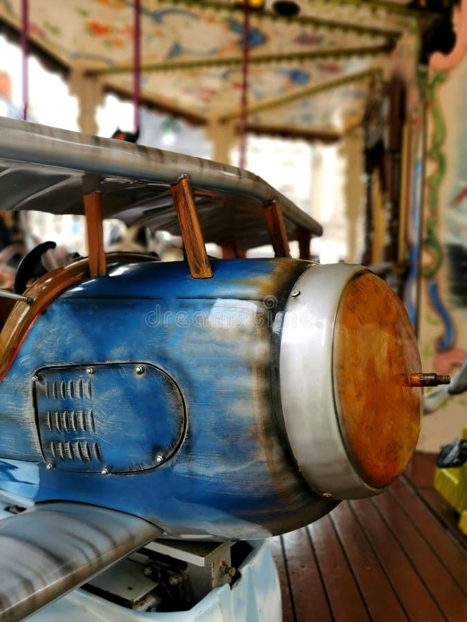 A plane in a carousel stock image. Image of adults, plane - 224815289