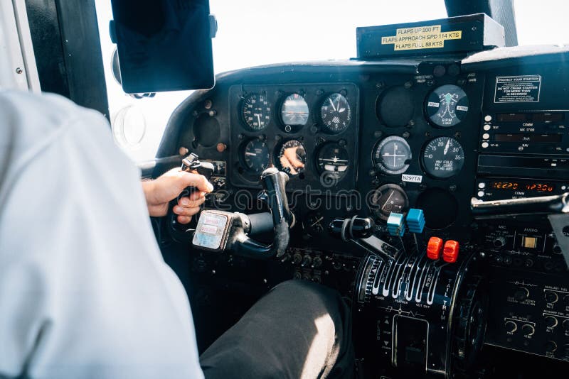 Plane Cockpit and a Pilot Flying a Private Plane Stock Photo - Image of ...