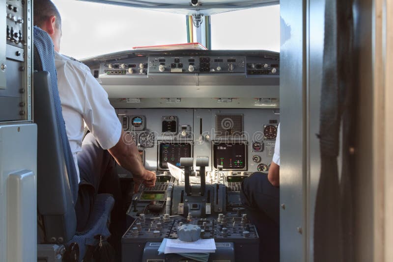 Plane Cockpit with Pilots after Landing Stock Photo - Image of flying ...