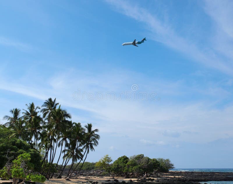 Plane over tropical island stock image. Image of plane - 29758533