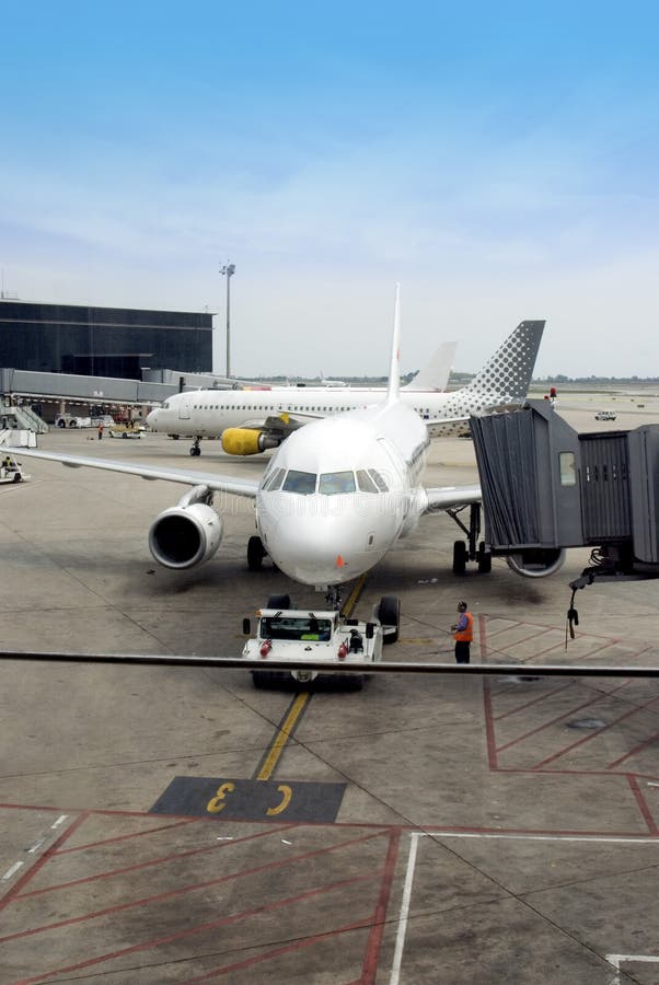 Plane Departing From Walkway Stock Image - Image of outdoors, airport ...