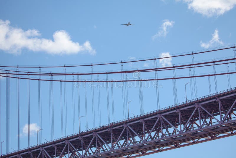 Plane Flies Over the Bridge Stock Image - Image of outdoor, cable ...