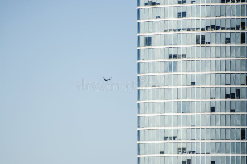 A Plane Flies Right in To the Building Stock Photo - Image of mall ...