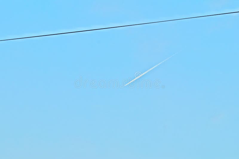 Plane flight in clear sky stock photo. Image of clear - 91322974