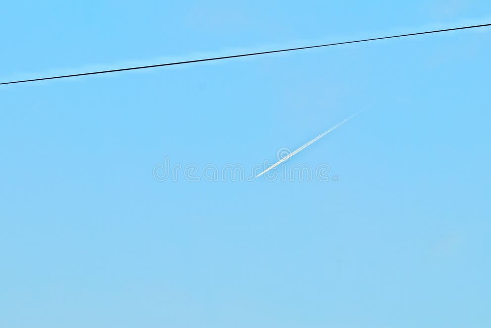 Plane flight in clear sky stock photo. Image of clear - 91322974