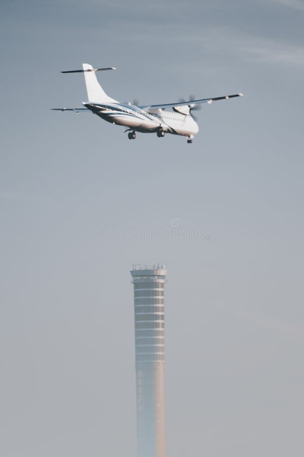 Plane through the Flight Control Tower. Stock Image - Image of travel ...