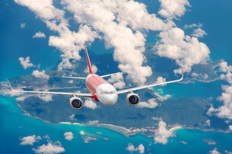 Plane flight over island stock image. Image of asia - 154786053
