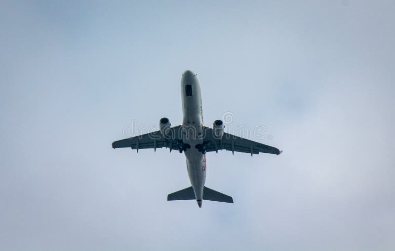 Plane Fly High Under Blue Sky Editorial Photo - Image of plane, high ...