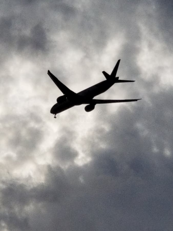 Plane Fly Over head stock photo. Image of plane, head - 166240172