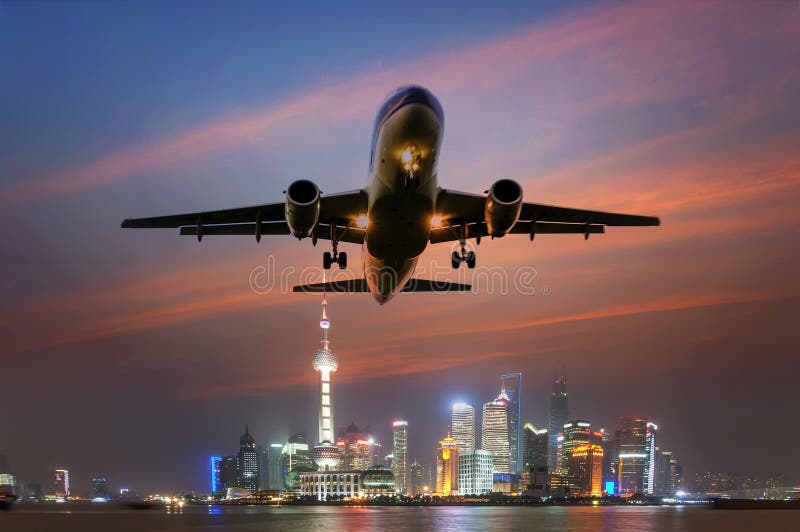 The Plane Fly Over the Shanghai Lujiazui Stock Image - Image of plane ...