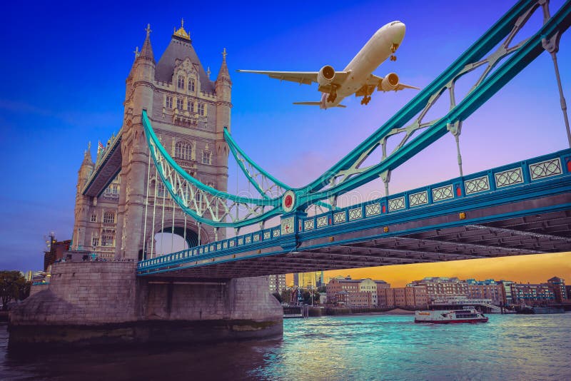 Plane Flying Above Tower Bridge at Sunset in London Stock Photo - Image ...