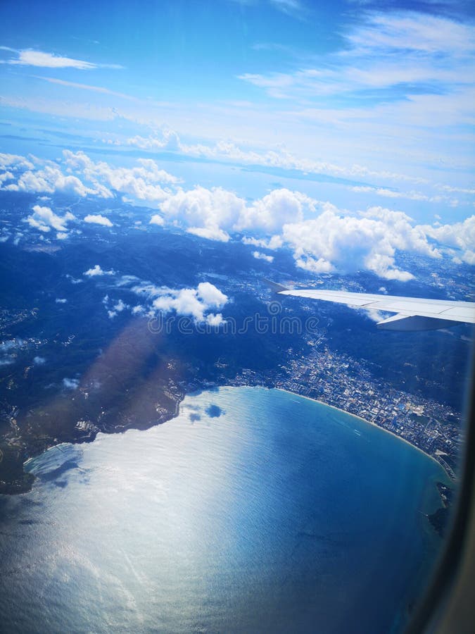 In the Plane Flying Blue Sky Stock Photo - Image of plane, sunlight ...