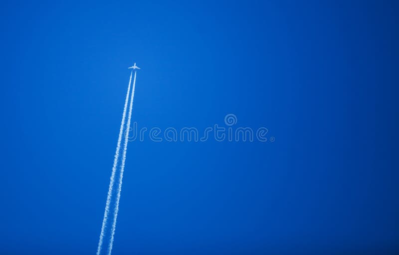 Plane Flying in Blue Sky Background Stock Photo - Image of ...