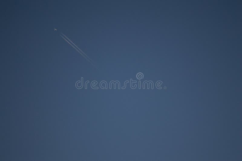 Fly high - contrails stock photo. Image of high, india - 128936914