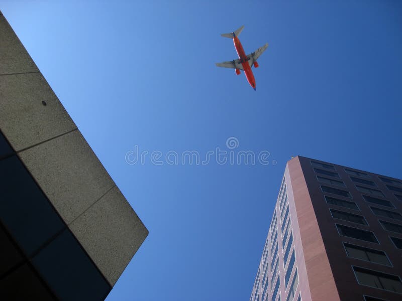Plane Flying Over City Picture. Image: 4461991
