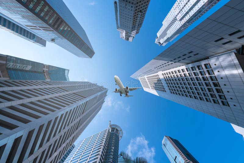 Plane Flying Over City on Blue Sky Stock Image - Image of airplane ...