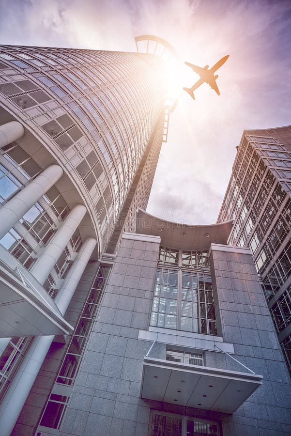 Plane Flying Over Modern Office Skyscraper Stock Photo - Image of ...