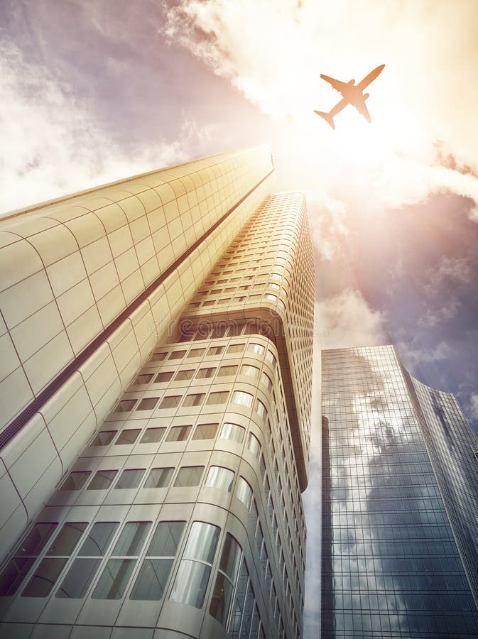 Plane Flying Over Modern Office Towers Stock Photo - Image of aviation ...