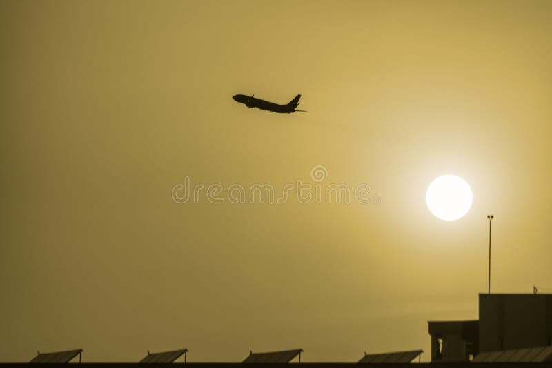 Plane Flying Over the Sun Rising Stock Photo - Image of modern ...