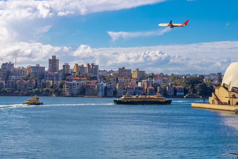 Plane Flying Over Sydney Harbour Sydney NSW Australia. Stock Photo ...