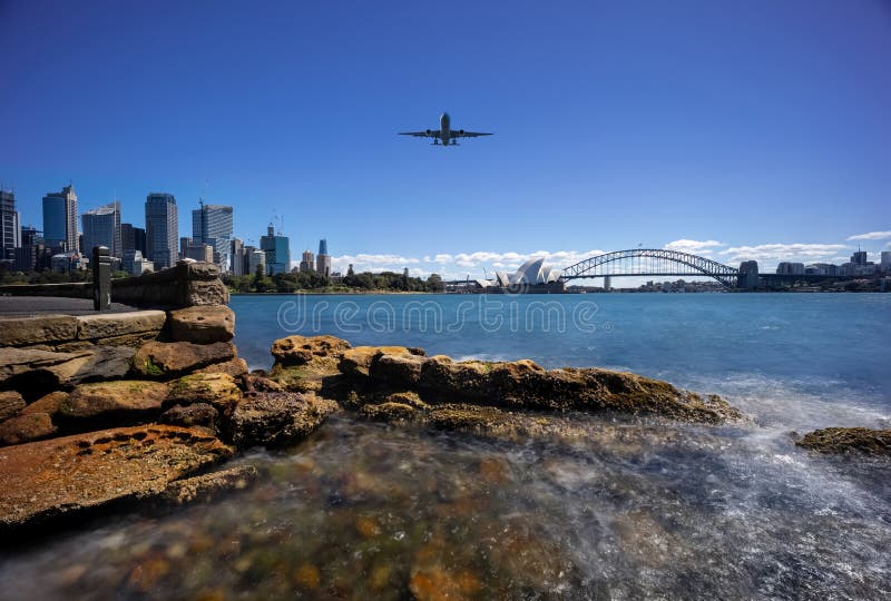 Plane Flying Over Sydney Harbour Sydney NSW Australia. Stock Image ...